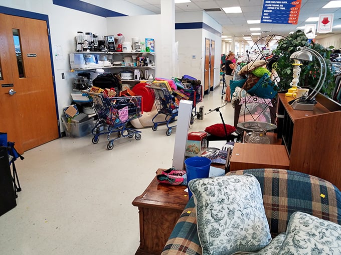 The back corner reveals a jumble of household items&mdash;where coffee makers and cozy couches mingle in secondhand harmony.