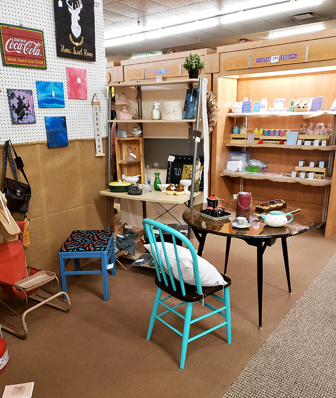 This cozy corner booth showcases the perfect blend of function and nostalgia—that turquoise chair is practically begging to come home with you.