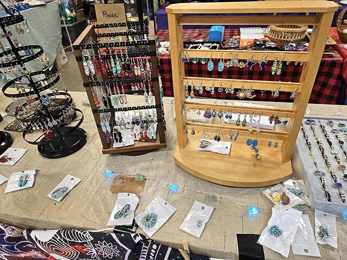 Handcrafted jewelry displays showcase the artistry of local creators. Each earring tells a different story&mdash;yours begins the moment you choose one.