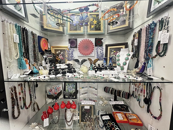 This jewelry display could make Elizabeth Taylor pause mid-sentence—vintage necklaces and brooches waiting to adorn new necks and lapels.