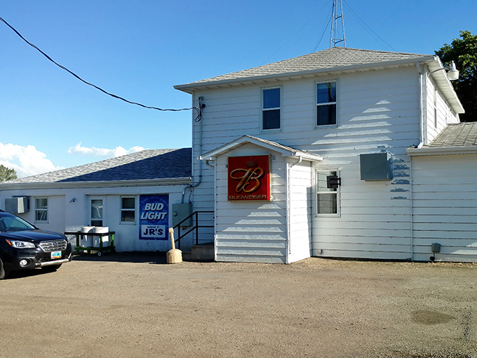 JR's Bar might not win architectural awards, but locals know the unassuming white building houses burgers worth crossing county lines for.