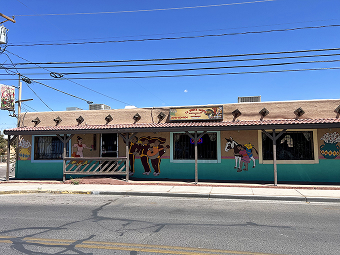 La Nueva Casita Café's colorful exterior is like a preview of the flavor explosion waiting inside—vibrant murals that hint at the authentic New Mexican cuisine served within.