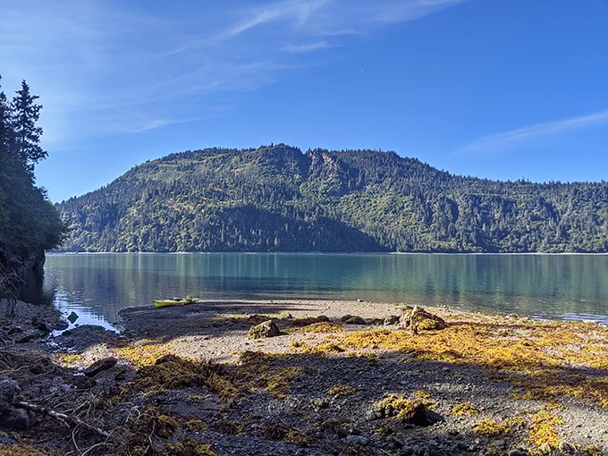 Turquoise waters meet mountain majesty at this hidden cove, where that yellow kayak isn't just transportation&mdash;it's your front-row seat to nature's greatest show.