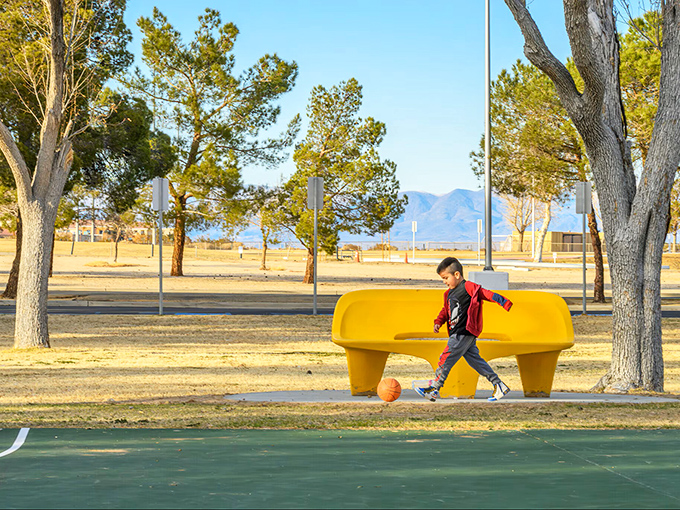 At Leroy Jackson Park, kids can burn energy while parents burn considerably fewer calories on those cheerful yellow benches. Desert recreation at its finest!