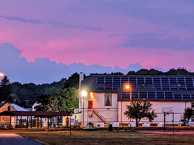 Cotton candy skies paint Plainfield at dusk, transforming ordinary buildings into silhouettes worthy of a meditation app background.