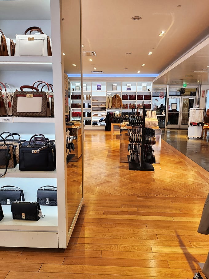 Designer handbags line the shelves like trophies in a museum of fashion, except here you can actually touch them—and maybe even afford one.