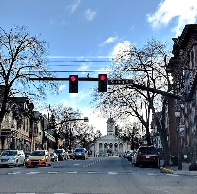 Spring Street stretches toward the courthouse like a timeline of American architecture, where every building tells a story worth hearing.