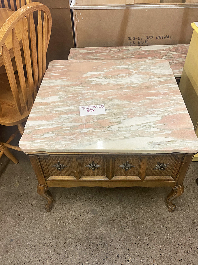 This vintage marble-top table whispers stories of dinner parties past while waiting for its next chapter in someone's home.