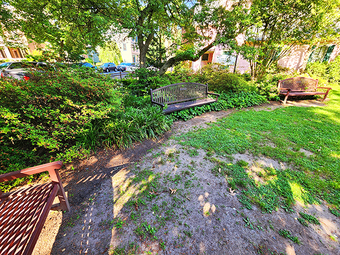 This pocket park proves that sometimes the best things come in small, perfectly manicured packages with benches.