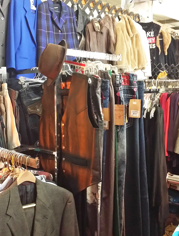 A leather vest that might have seen Woodstock hangs beside blazers with stories to tell. Fashion archaeology at its finest!