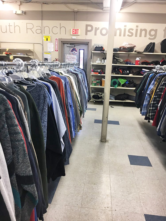 The men's clothing section resembles a well-organized fashion time capsule, where yesterday's styles await their inevitable comeback.