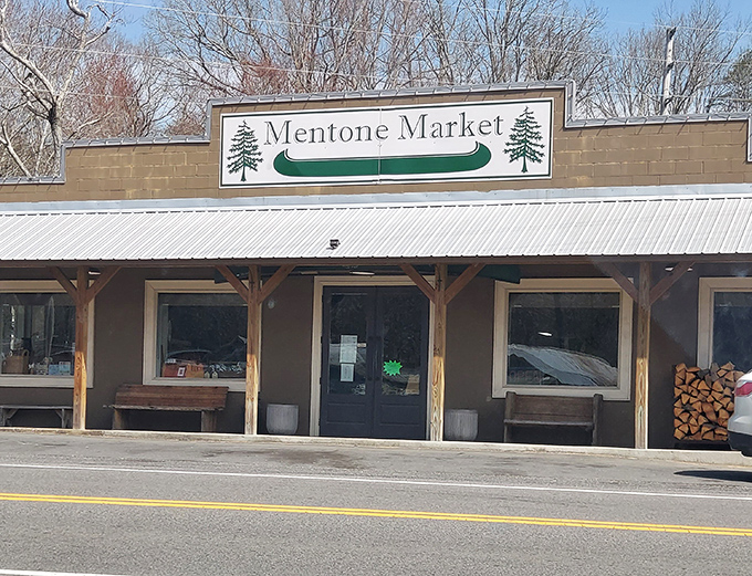 The Mentone Market, with its canoe sign and rustic benches, promises more than groceries&mdash;it's where stories are exchanged as freely as dollar bills.