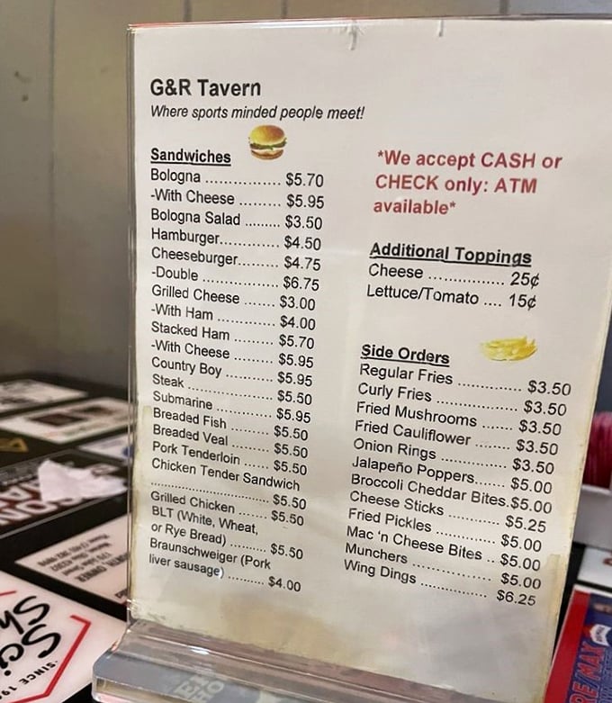 A menu that hasn't surrendered to food trends or inflation. The bologna sandwich sits proudly at the top, as it should.