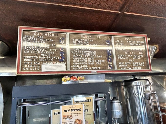 That vintage menu board isn't retro chic &ndash; it's the real deal, displaying decades of diner classics that have satisfied generations.