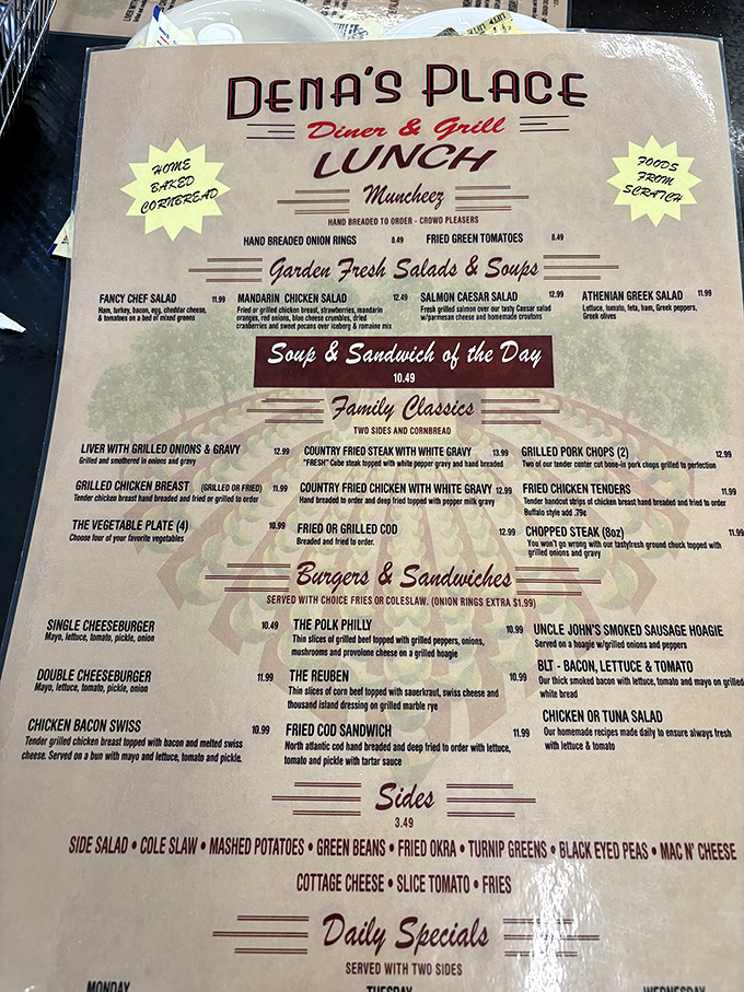 A menu that reads like a love letter to comfort food classics. That "Home Baked Cornbread" star burst isn't just decoration&mdash;it's a promise.