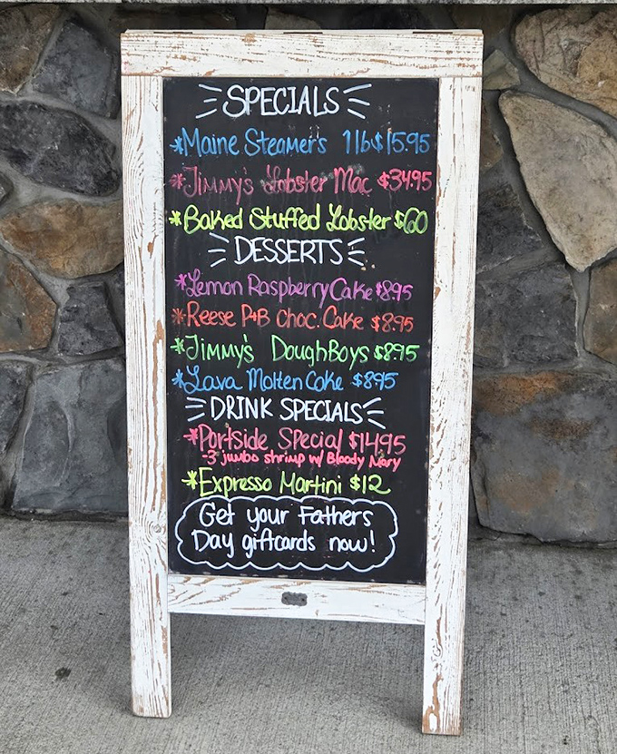 The colorful chalkboard menu reads like a love letter to seafood enthusiasts&mdash;Maine steamers and Jimmy's Doughboys beckon irresistibly.