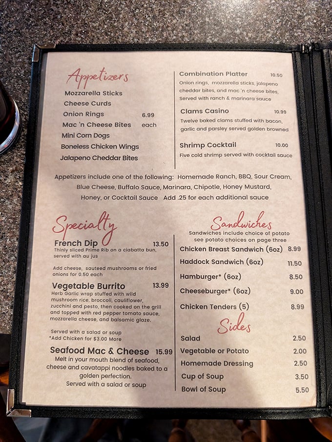 A menu that reads like a greatest hits album of supper club classics. The Seafood Mac & Cheese is calling my name louder than my cardiologist.