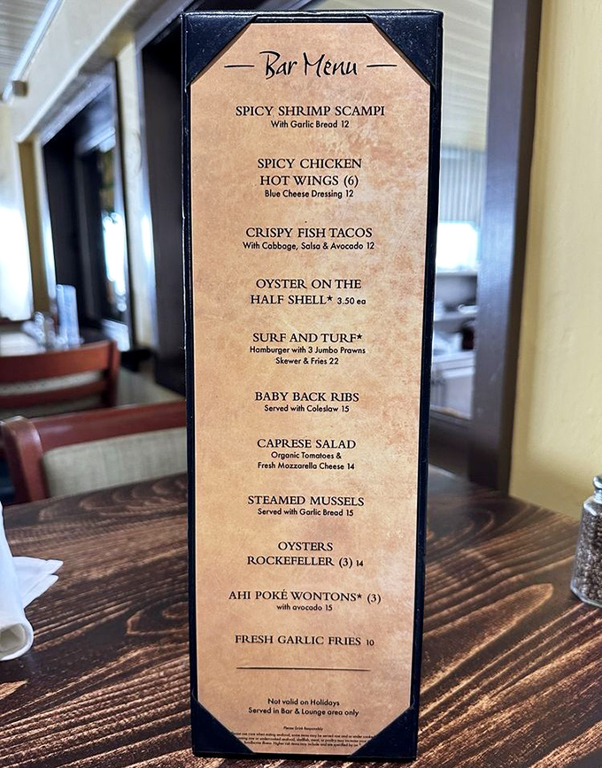 This bar menu isn't playing around&mdash;Spicy Shrimp Scampi and Ahi Poke Wontons are just appetizers in this seafood symphony.