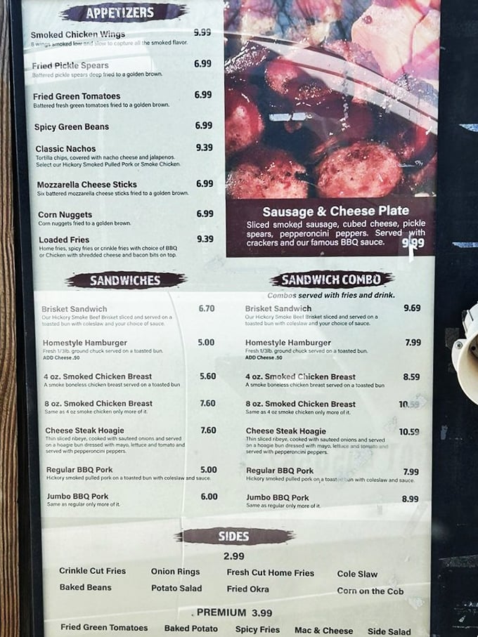 The menu reads like a love letter to smoked meats, with appetizers that could be meals themselves and sandwiches that demand a two-handed commitment.