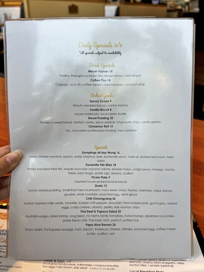 This menu reads like a love letter to fusion cuisine. Each description is a promise of flavor that makes decision-making deliciously difficult.