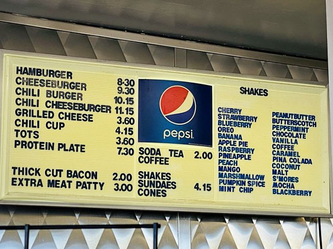 A menu board that hasn't surrendered to food trends or fancy descriptions. Just straightforward burger perfection with shakes that demand your attention.