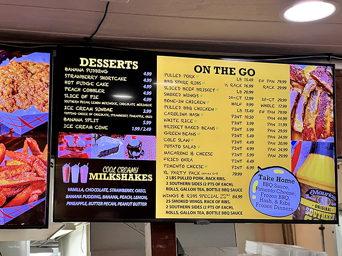 The menu board tells a delicious story in yellow and white &ndash; a roadmap to barbecue bliss with all the Southern fixings your heart desires.