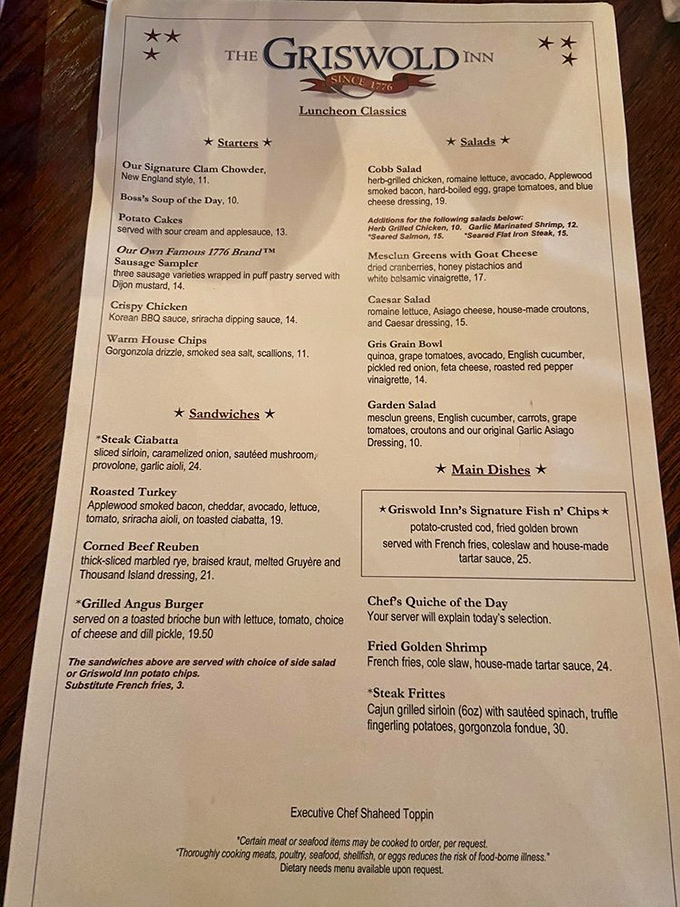 The menu reads like a love letter to New England cuisine, featuring the legendary clam chowder that has Connecticut residents making special pilgrimages to Essex.