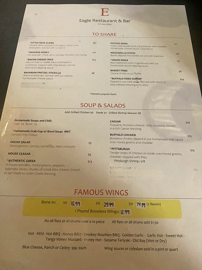 A menu that reads like a love letter to comfort food classics. Those "Sausage Honey" and "Little Neck Clams" aren't just appetizers&mdash;they're the opening act to a memorable meal.