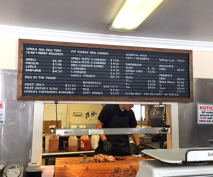 A menu board that tells you everything you need to know about life's priorities&mdash;meat first, everything else second.
