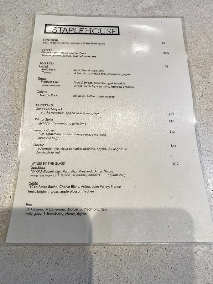 The menu reads like culinary poetry&mdash;tonkotsu broth, artisanal cocktails, and wines described with such vivid detail you can almost taste them.