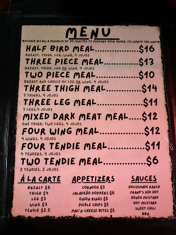 The handwritten menu tells you everything you need to know: chicken, jojos, and patience. Good things come to those who wait 30 minutes.