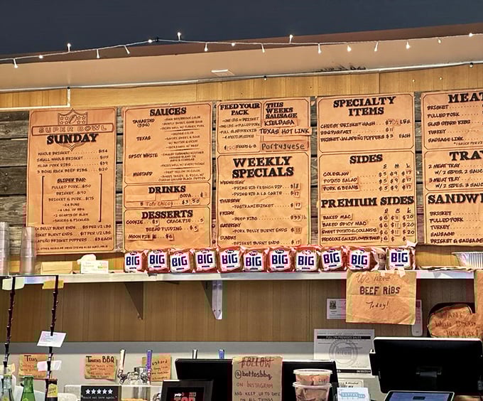That menu board isn't just a list; it's a treasure map to carnivorous bliss. Notice the "SOLD OUT" notes&mdash;badges of honor in BBQ culture. 