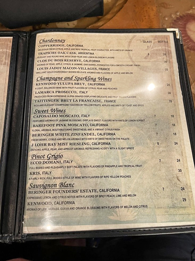 The wine list reads like a global passport for your palate. Remember, nothing complements crab legs quite like a crisp Sauvignon Blanc—liquid sunshine in a glass.