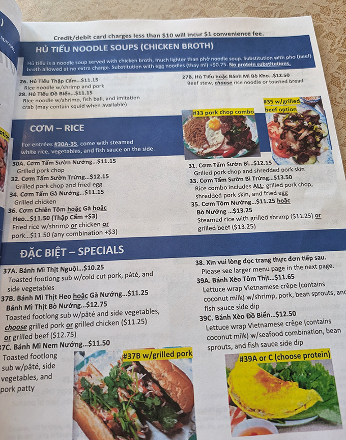 The menu reads like a love letter to Vietnamese cuisine, with each dish promising a flavor adventure that'll have you planning your next visit before finishing your first.