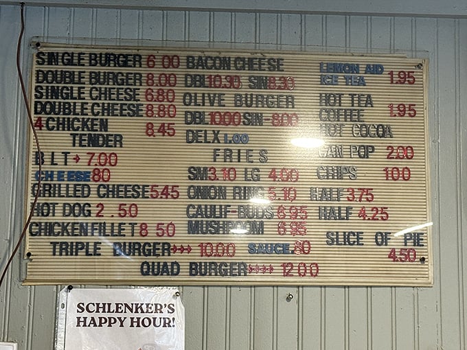 A menu board that tells you everything you need to know about life's priorities. When a quad burger exists, why settle for anything less?