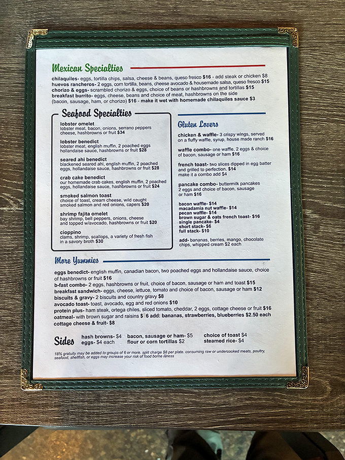 A menu that reads like poetry to seafood lovers. The "Seafood Specialties" section isn't just a list &ndash; it's a bucket list for your taste buds.