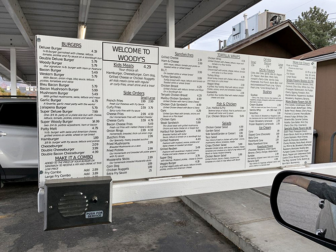 The menu board at Woody's reads like a love letter to American classics. Decision paralysis has never been so delicious!