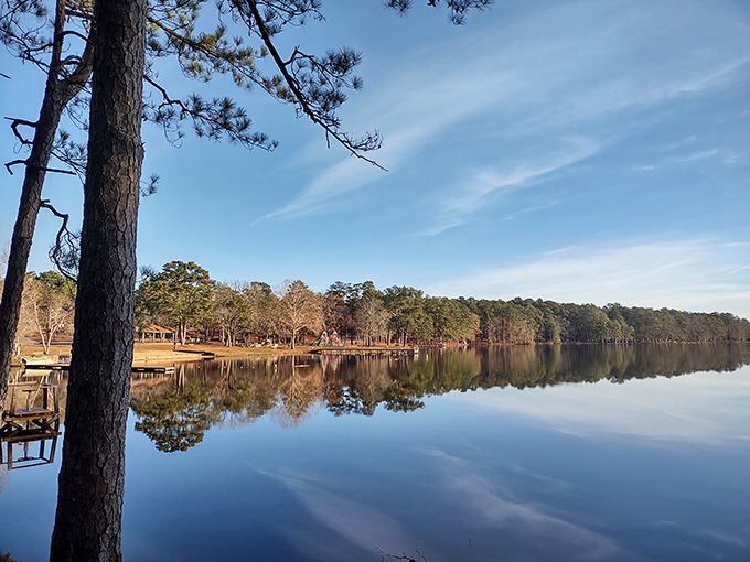 Stillness speaks volumes here. The morning light transforms Clarkco's lake into nature's most perfect mirror, doubling the beauty.