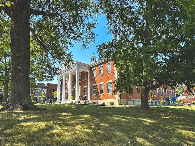 The Montgomery County Courthouse stands proudly with its classic columns and brick facade&mdash;where important government business happens alongside occasional bake sale planning.