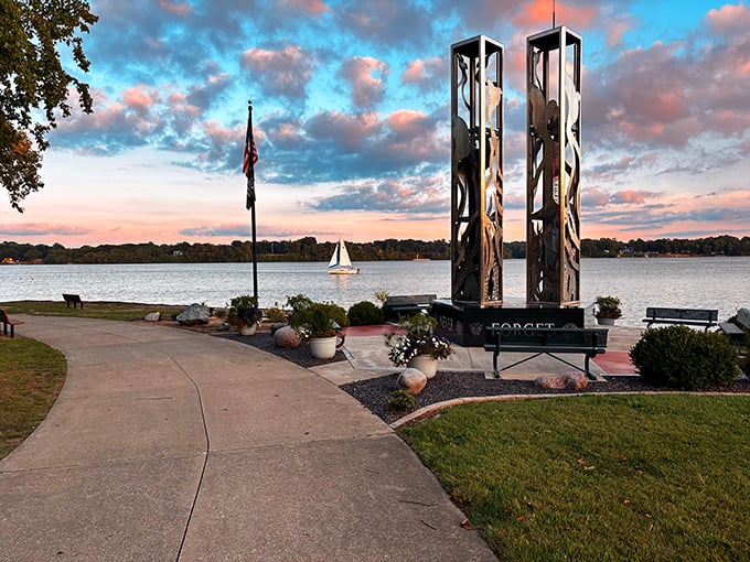 Sunset transforms Lake Decatur into a postcard moment, with memorial towers standing sentinel against a cotton candy sky. 