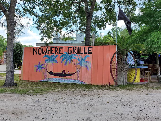 The Nowhere Grille's coral-colored exterior and hammock mural perfectly capture Florida's laid-back philosophy: paradise isn't a destination, it's a state of mind.