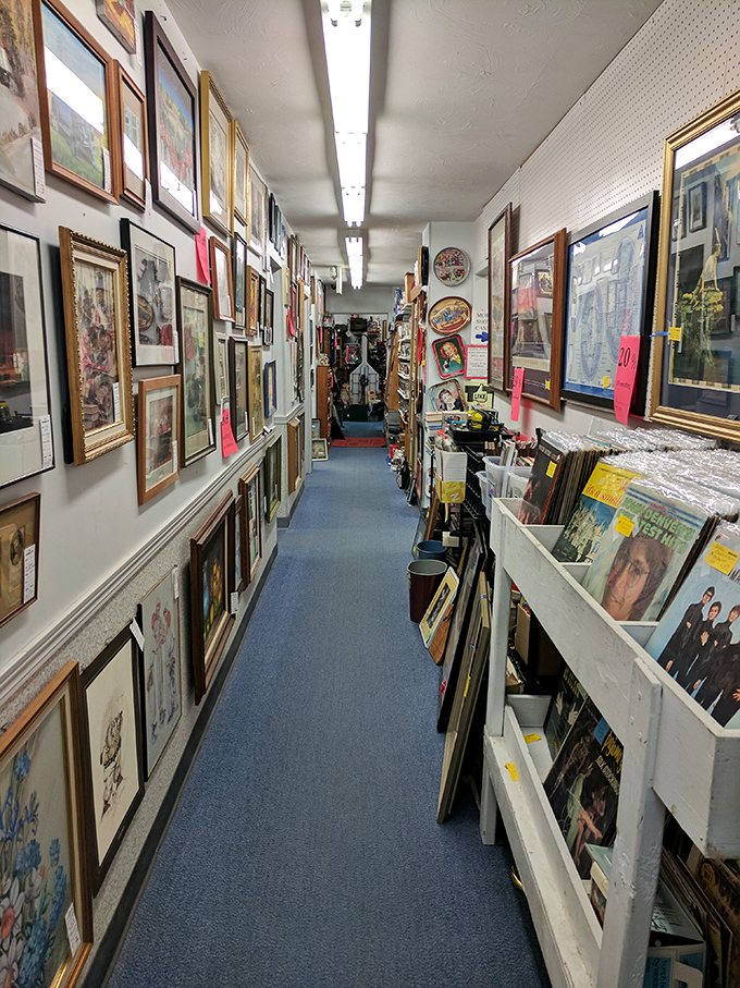 Wall-to-wall memories hang in perfect formation, while vinyl records stand ready to transport you back to your first dance.