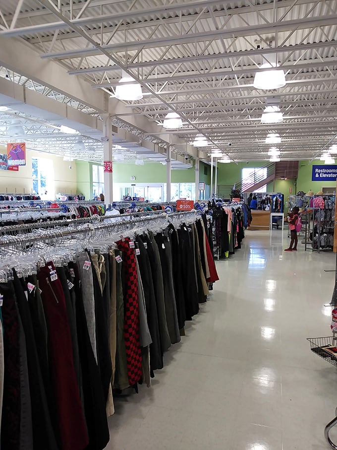 Rows of perfectly aligned pants stand at attention like an army of fabric possibilities, each with a story hanging from its hems.