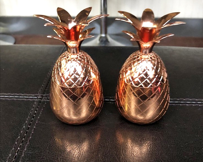 These copper pineapple treasures are the quintessential thrift store find&mdash;someone's discarded decor becomes your conversation-starting cocktail accessories.