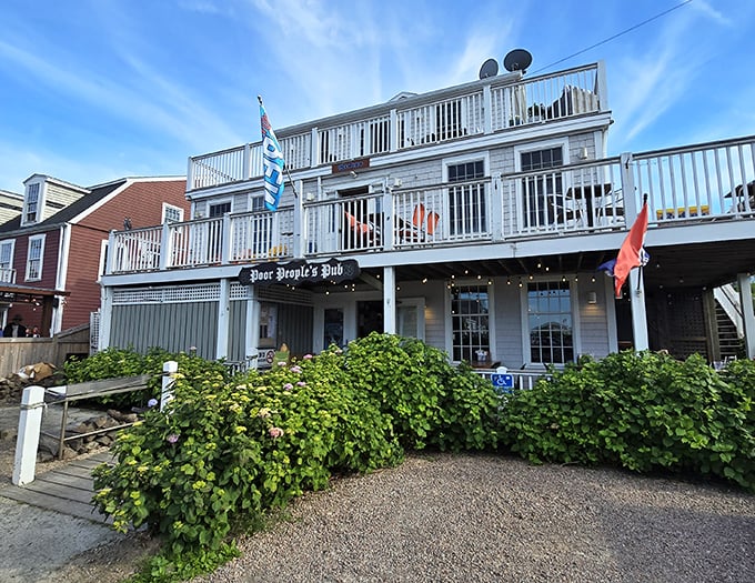 Poor People's Pub: where the name is humble but the food is anything but. Their deck offers the perfect perch for people-watching while savoring local seafood.