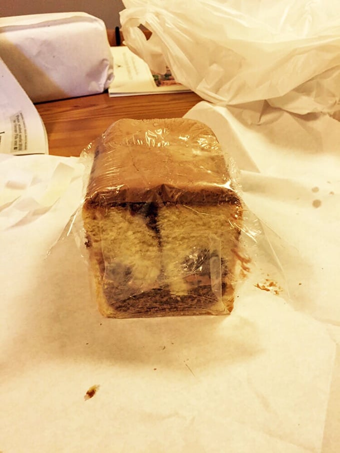 Behold the pound cake in its natural habitat: perfectly wrapped, patiently waiting to become the highlight of someone's afternoon.