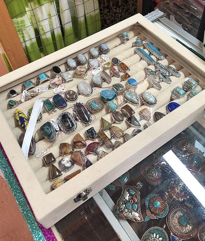 A jewelry box dream come true! Turquoise, silver, and gemstones galore, each ring telling its own story of craftsmanship and style.