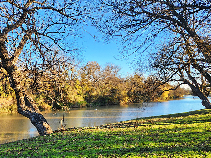 Nature doesn't need Instagram filters at Riverside Park, where the Pecan Bayou reflects Texas skies and whispers stories of generations past.