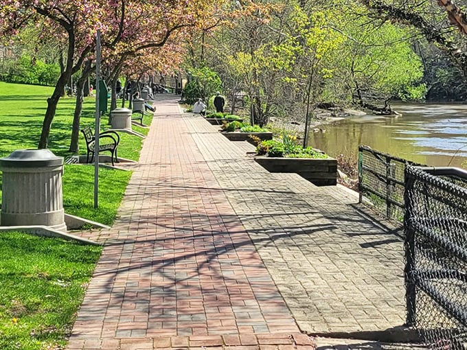 Riverside Park's brick pathway invites leisurely strolls where you can ponder life's big questions or simply appreciate how good trees look in springtime.