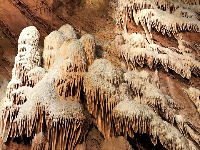 These cascading formations look like melted vanilla ice cream frozen in time. Mother Nature's patience created these delicate, rippling curtains over thousands of years.
